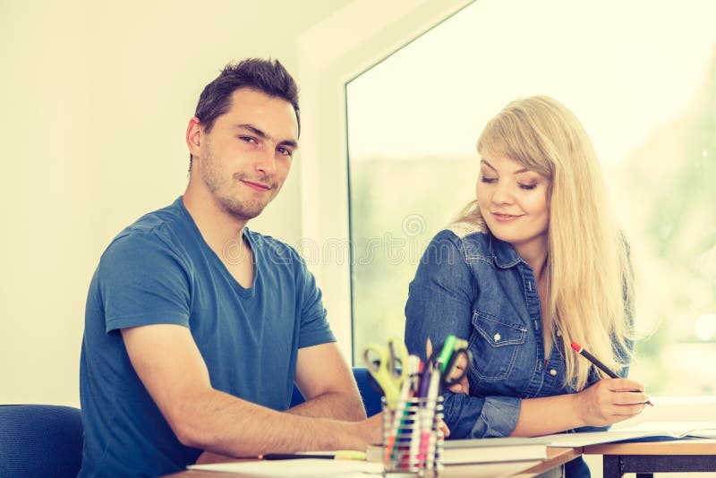 Two Students Talking in Classroom Stock Image - Image of teenager ...