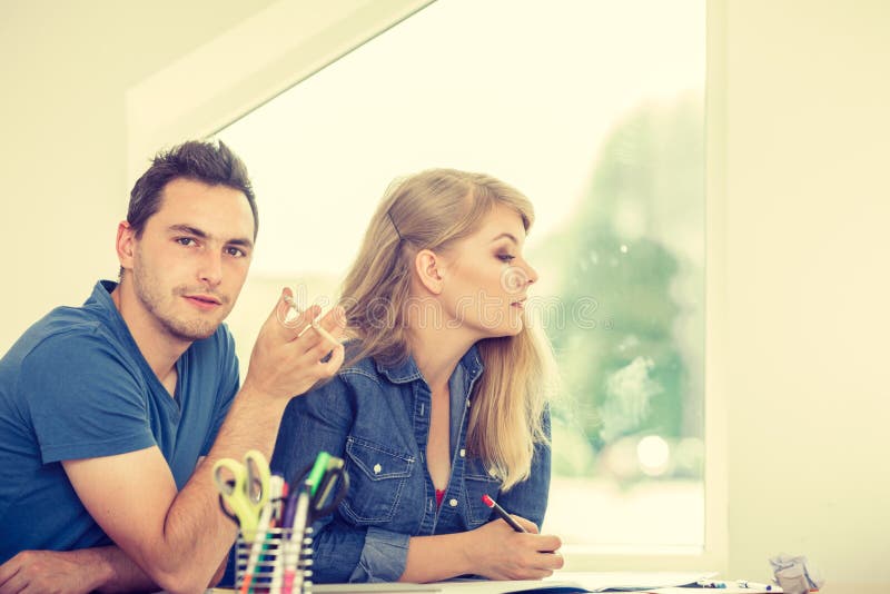 Two Students Talking in Classroom Stock Photo - Image of university ...
