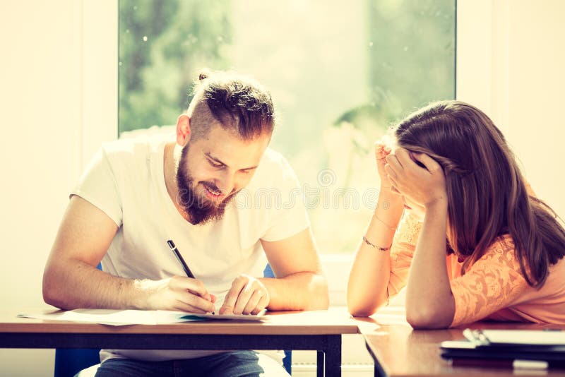 Two Students Talking in Classroom Stock Image - Image of teenage, happy ...