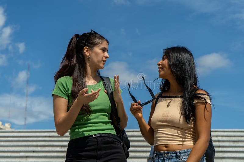 Two Students Talking on University Campus on a Sunny Day Stock Image ...