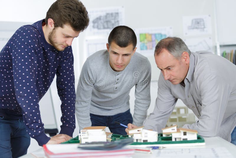 Two Students at Their Desk with Building Model Stock Photo - Image of ...