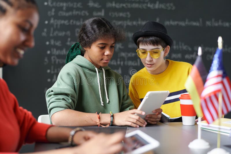 Two Students Using Digital Tablet at School Stock Photo - Image of ...