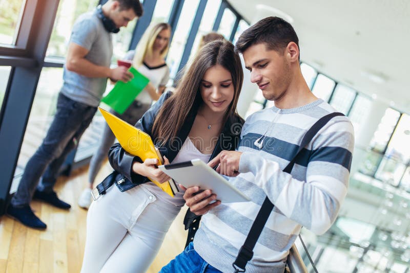 Students Using they Digital Tablet in a University Stock Image - Image ...