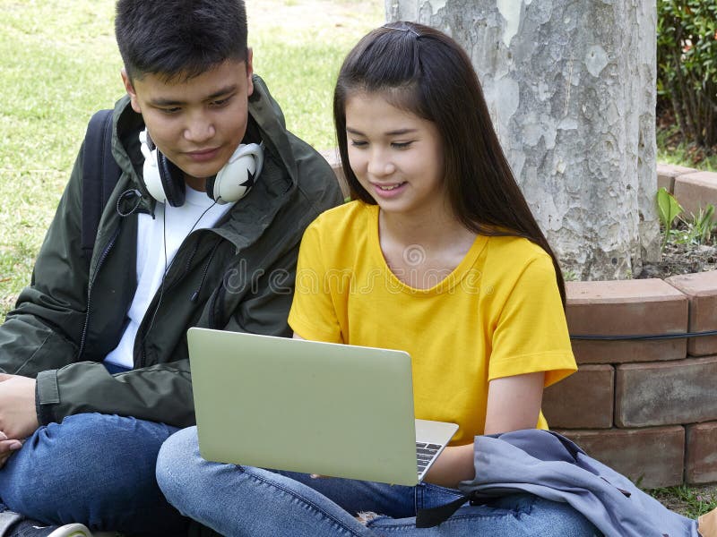 Two Students Using Laptop in the Park Stock Photo - Image of smile ...