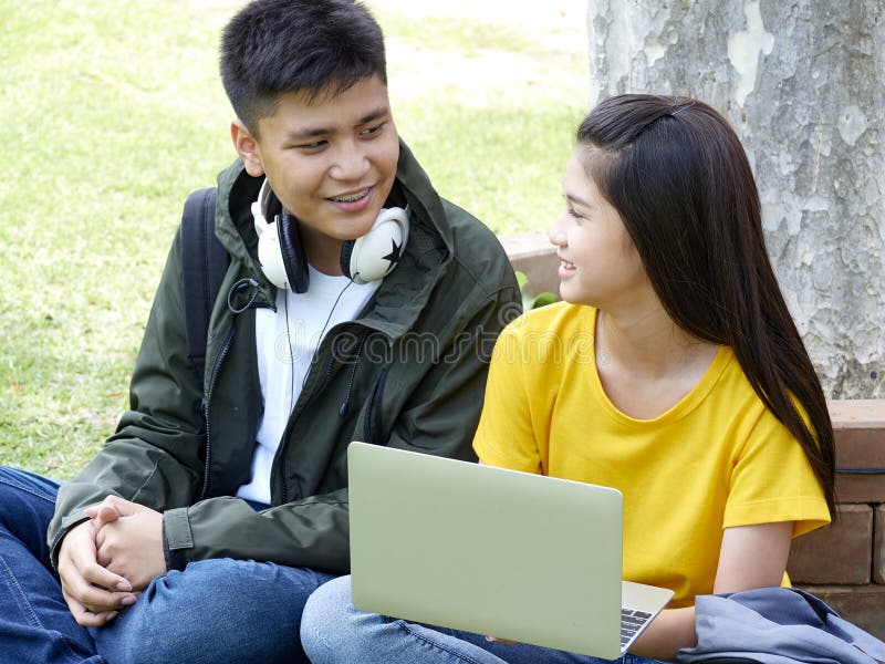 Two Students Using Laptop in the Park Stock Image - Image of student ...