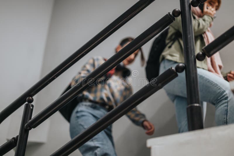 Two Students Walking Upstairs Heading To Class at School Stock Image ...