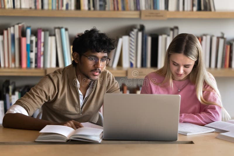 Two Students Working on Joint Assignment, Preparing for Exam Together ...
