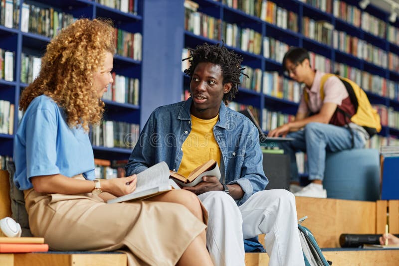 Two Students Working in Library Stock Image - Image of student, indoors ...