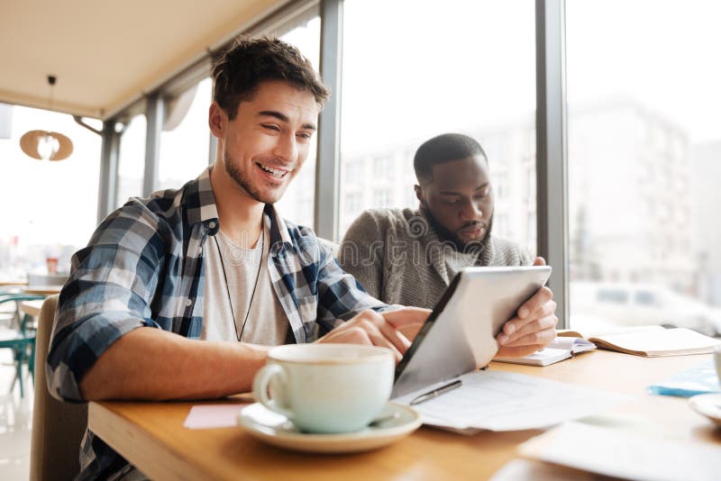 Two Students Working on Tablet Together Stock Image - Image of college ...