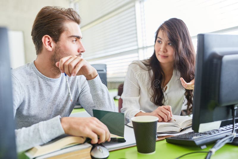 Two students in workshop stock photo. Image of class - 115791888