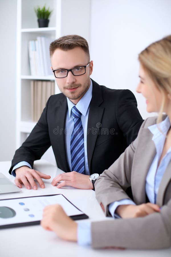 Two Successful Business Partners Working at Meeting in Office Stock ...