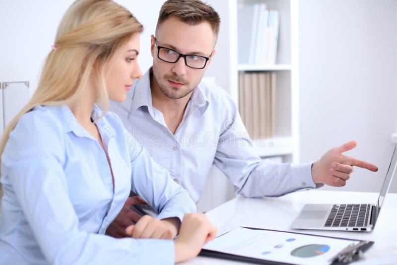 Two Successful Business Partners Working at Meeting in Office Stock ...