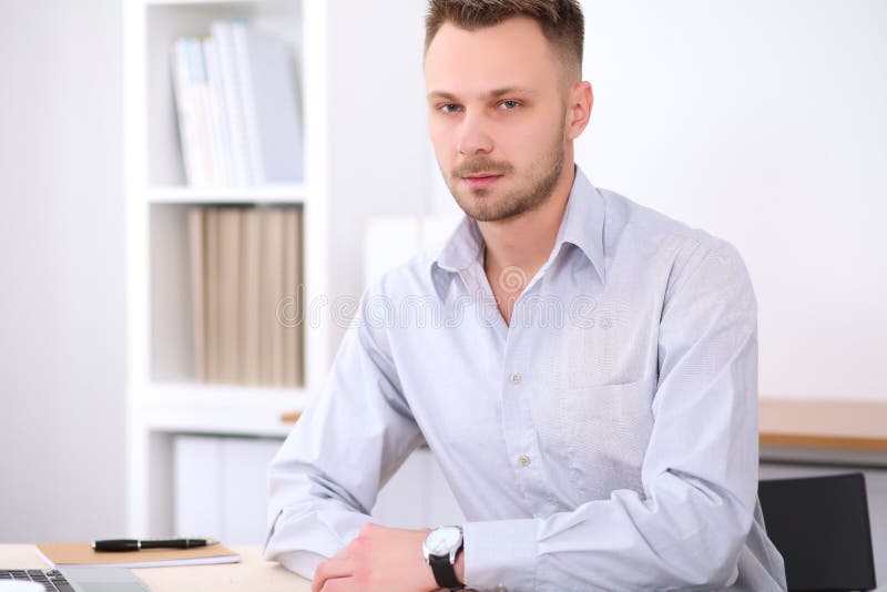 Two Successful Business Partners Working at Meeting in Office. Focus on ...