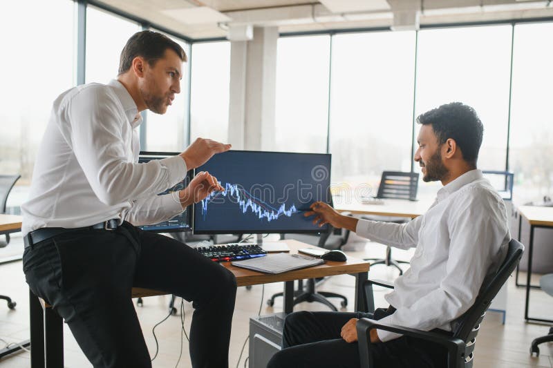 Two Successful Trader in Formalwear Pointing at Display, Analyzing Stat ...