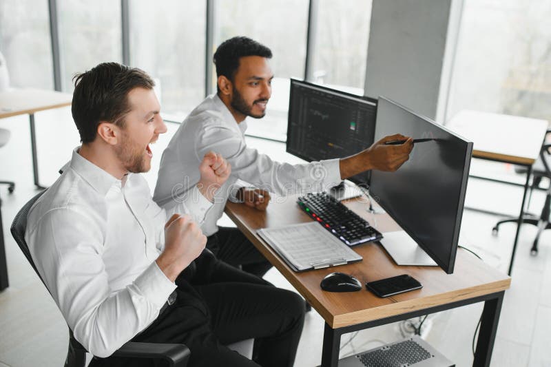 Two Successful Trader in Formalwear Pointing at Display, Analyzing Stat ...