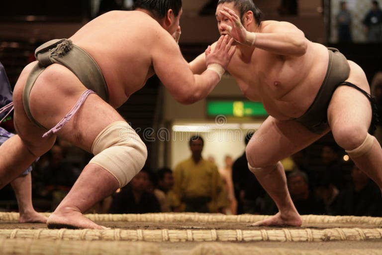 Two Sumo Wrestlers Engaging in a Fight Editorial Stock Photo - Image of ...