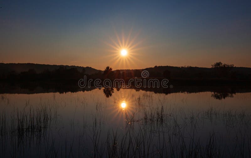Two suns stock photo. Image of dawn, nature, beautiful - 257378282