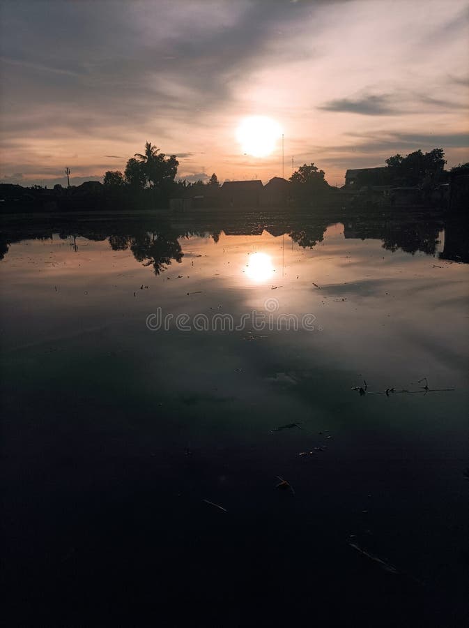 Two suns stock photo. Image of cloud, night, sunrise - 264329436