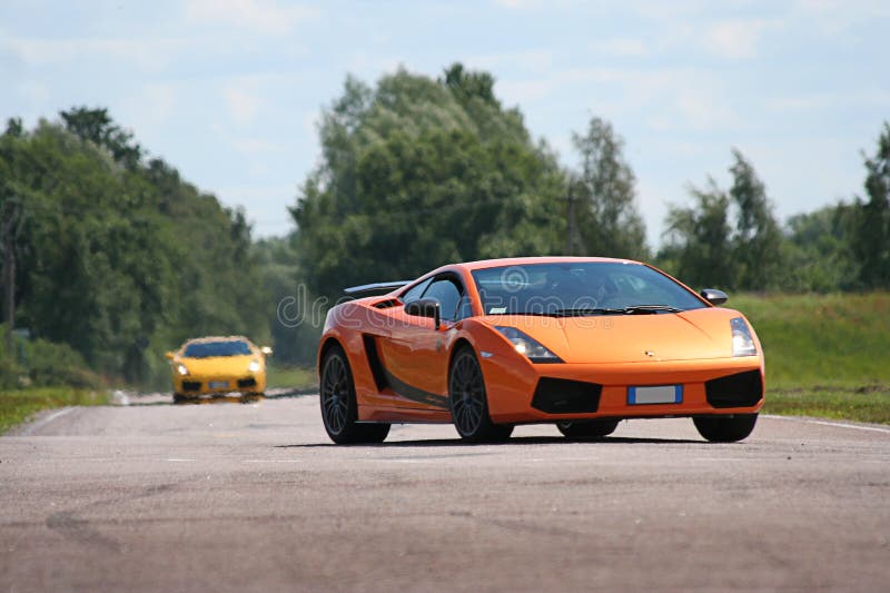 Two Supercars on a Racetrack Editorial Photo - Image of fast ...