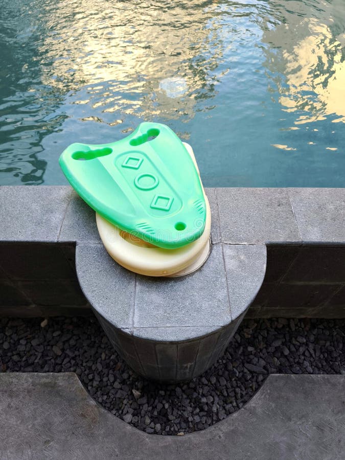 Two Swimming Boards at the Edge of the Swimming Pool Stock Photo ...