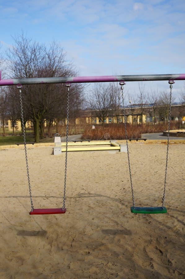 Two swings stock image. Image of play, swings, sand, chain - 51322501
