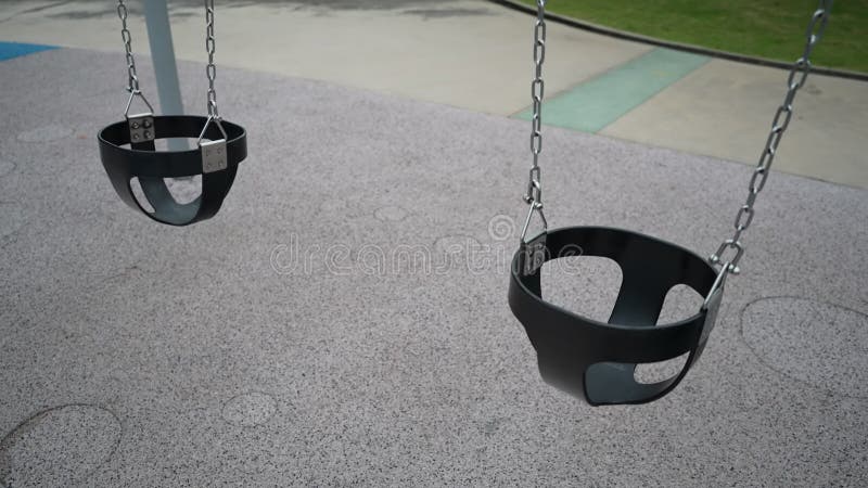 Two Swings Side by Side in a Park Stock Video - Video of trees, grass ...