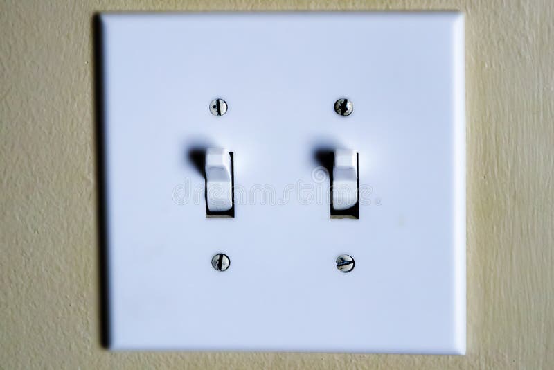 Double Lightswitch on White Wall Stock Image - Image of angle, natural ...