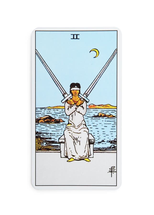 The Two of Swords Tarot Card on White Background, Top View Stock Image ...