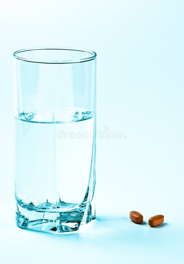Two Tablets and Glass of Water Stock Photo - Image of drink, medicine ...