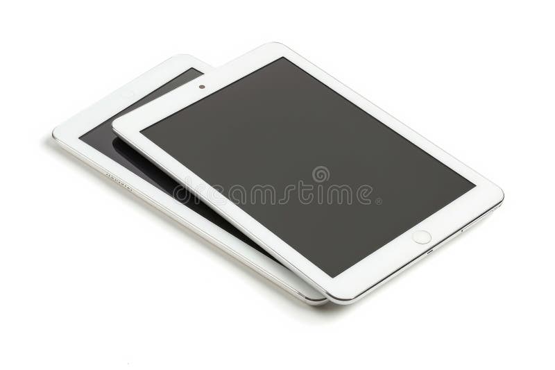 Two Tablets Sitting on Top of Each Other Stock Image - Image of stacked ...