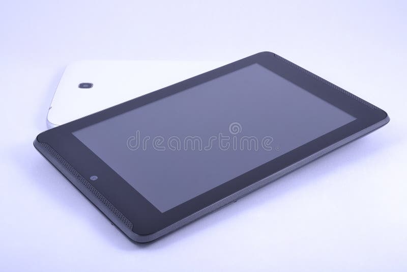 Two tablets at table stock photo. Image of gadgets, display - 56210264