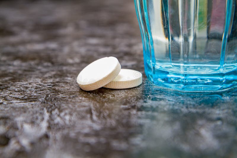 Two tablets and a stock photo. Image of pain, drink - 217209174