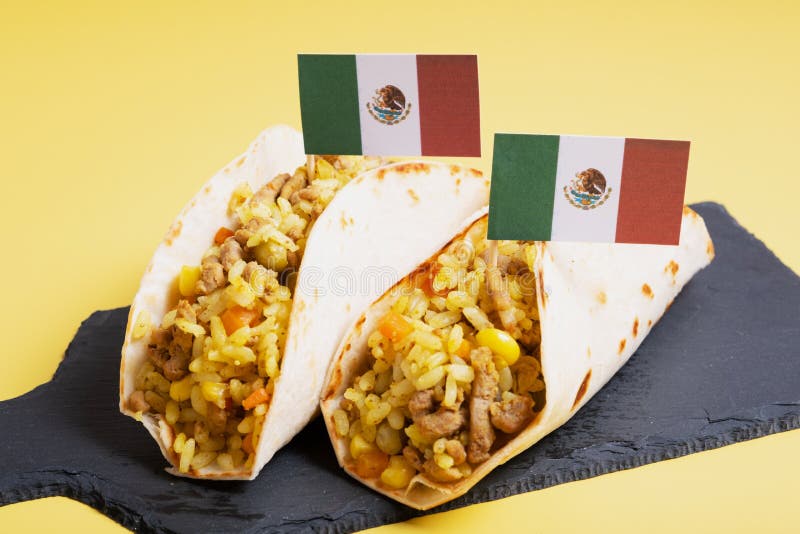 Two Tacos on a Black Board with Mexican Flags. the Concept of National ...