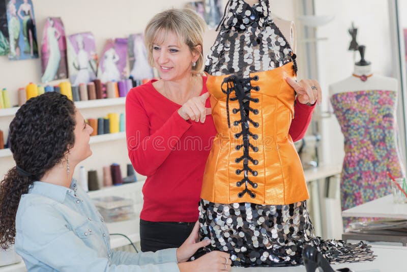 Two Tailors Talking in Workshop Stock Image - Image of textile ...