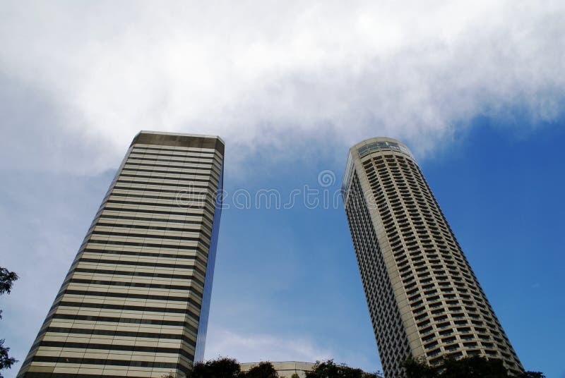Two tall buildings stock image. Image of cloud, cylindrical - 1845731