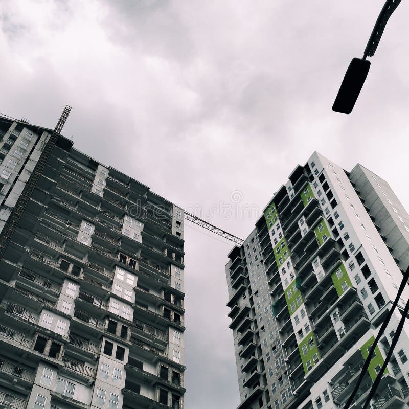 Two Tall Buildings that are Under Construction and Not yet Completed ...