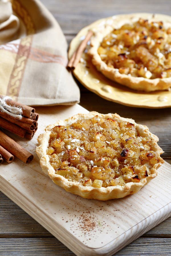 Two tart with apples stock photo. Image of orange, table - 44635424