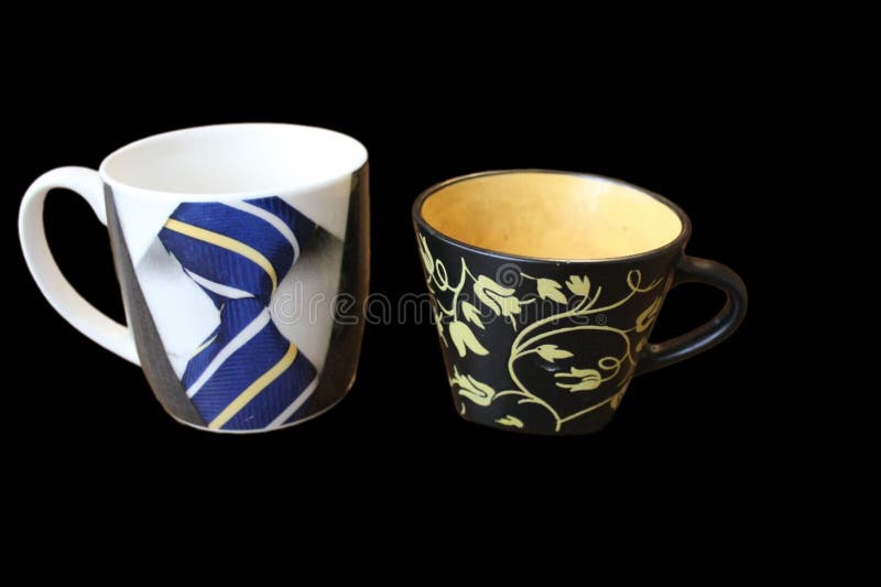 Two Tea Cups of Different Size and with Different Pictures Stock Image ...