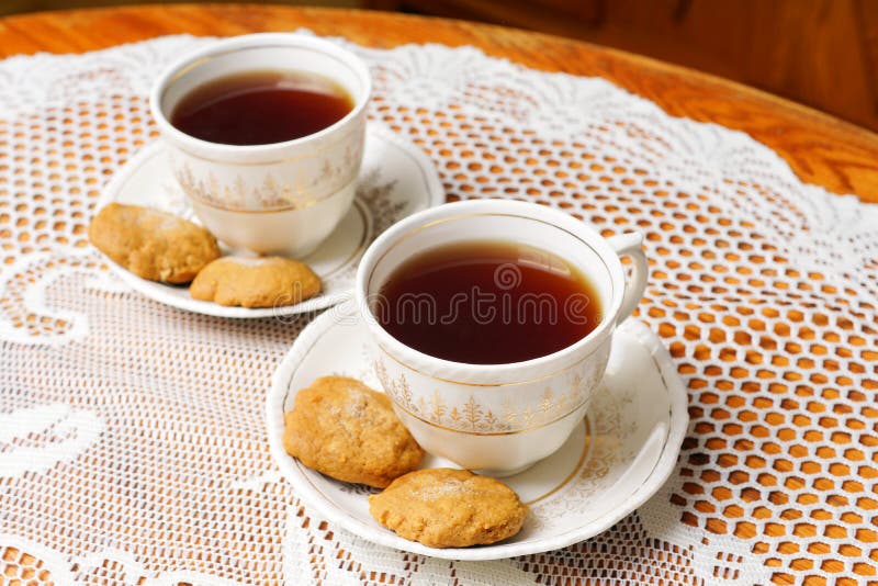 Two tea cups with gold stock photo. Image of beverage - 36757516