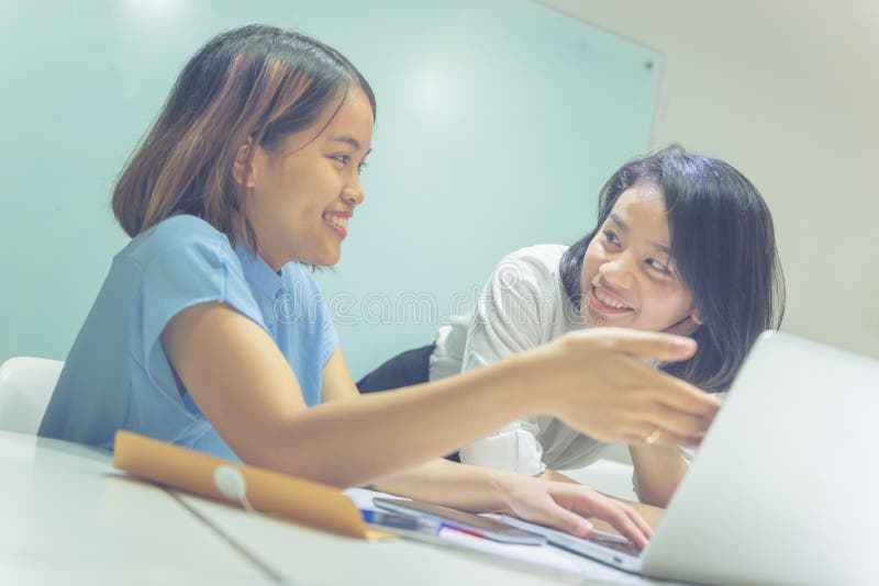 Two Team Member Talking about Sales Chart Report Stock Image - Image of ...