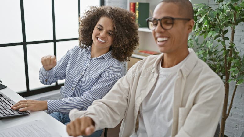 Two Team Partners, a Man and a Woman, Enjoy Working Together at the ...
