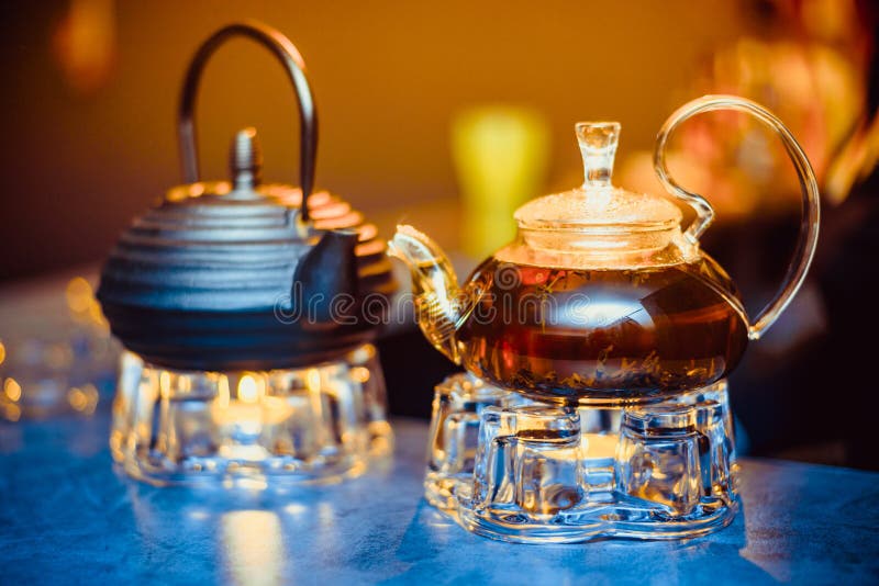 Two Teapots with Brewed Tea are on the Table in a Cafe Stock Image ...