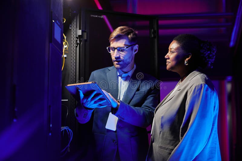 Female it Technicians Using Laptop in Server Room Stock Image - Image ...