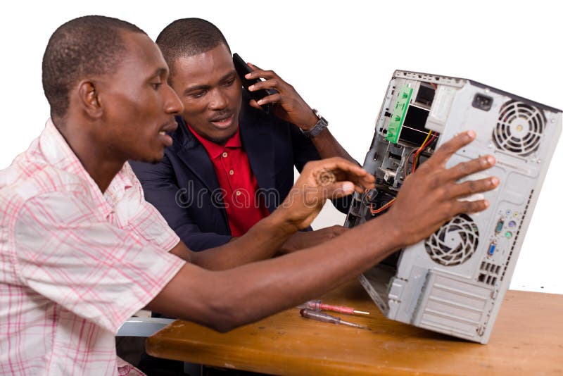 A Team of Computer Scientists Work Together on a Damaged Computer Stock ...