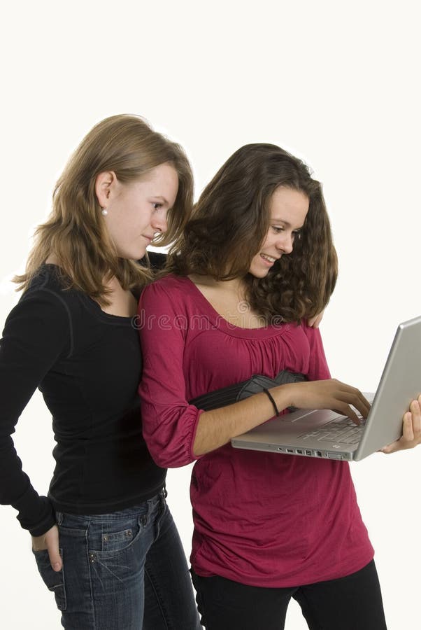 Two Teenage Girls Checking Mail Stock Image - Image of brunette, blond ...