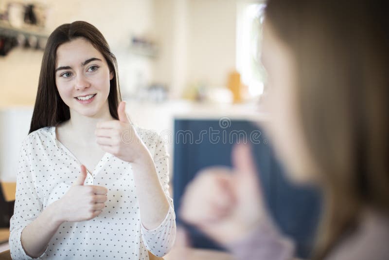Two Teenage Girls Having Conversation Using Sign Language Stock Image ...