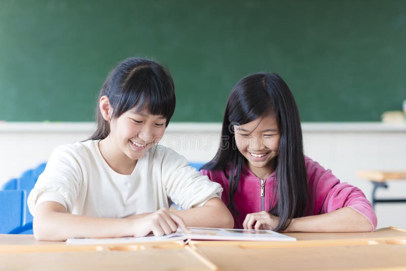 Two Teenage Girls Student Study in Classroom Stock Photo - Image of ...