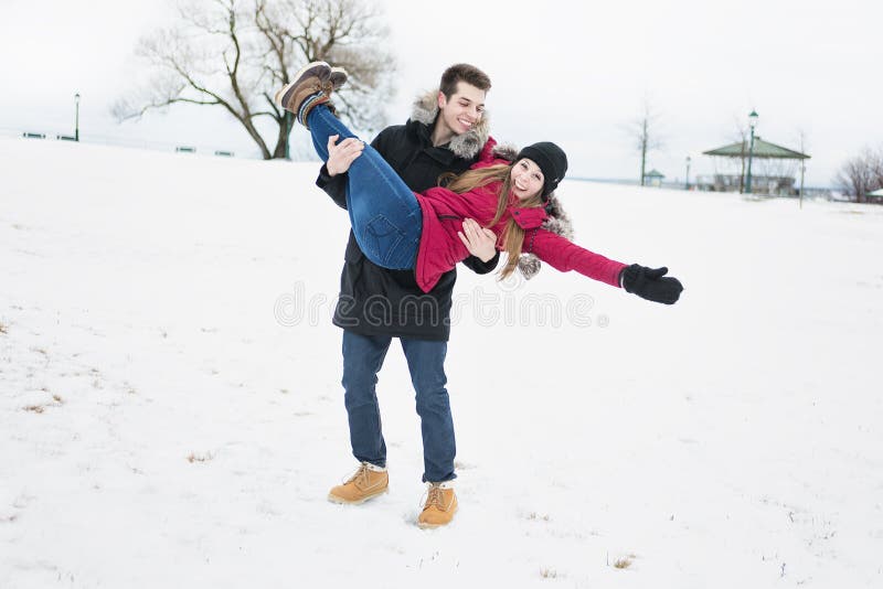 Two Teenagers Havinf Fun on the Snow Field Stock Photo - Image of happy ...