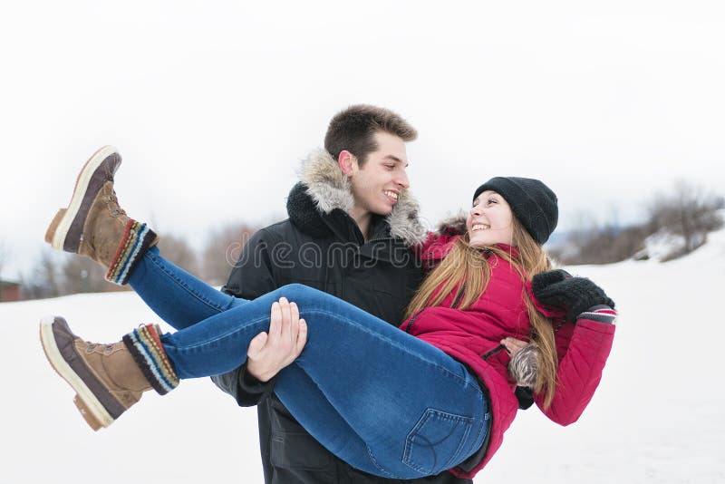 Two Teenagers Havinf Fun on the Snow Field Stock Photo - Image of frost ...