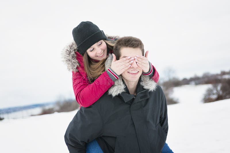 Two Teenagers Havinf Fun on the Snow Field Stock Photo - Image of frost ...